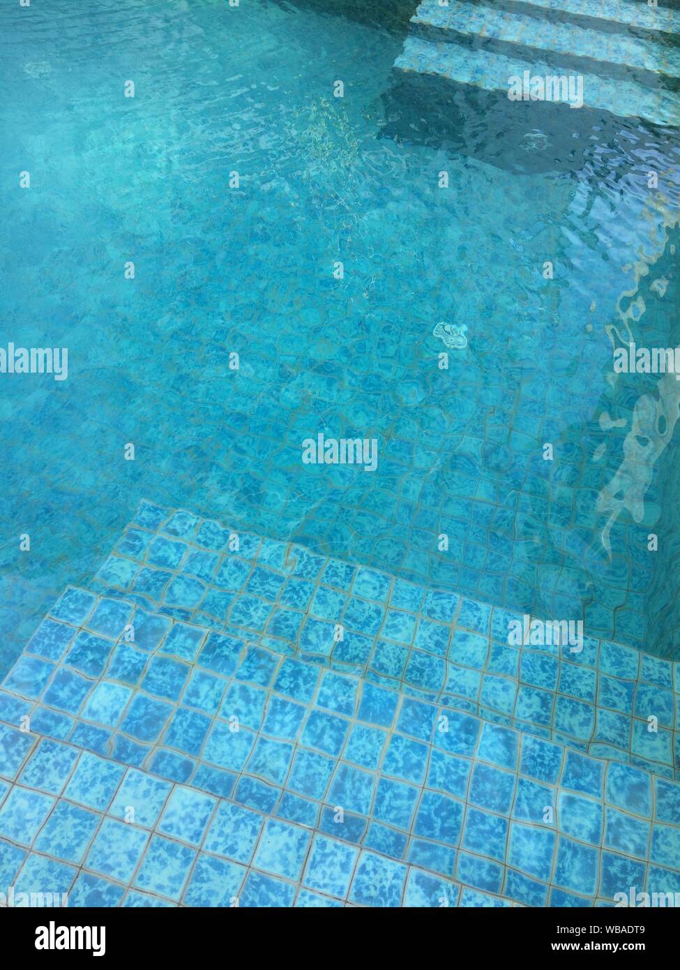 Vertical shot of stairs in the pool with a clear water Stock Photo - Alamy