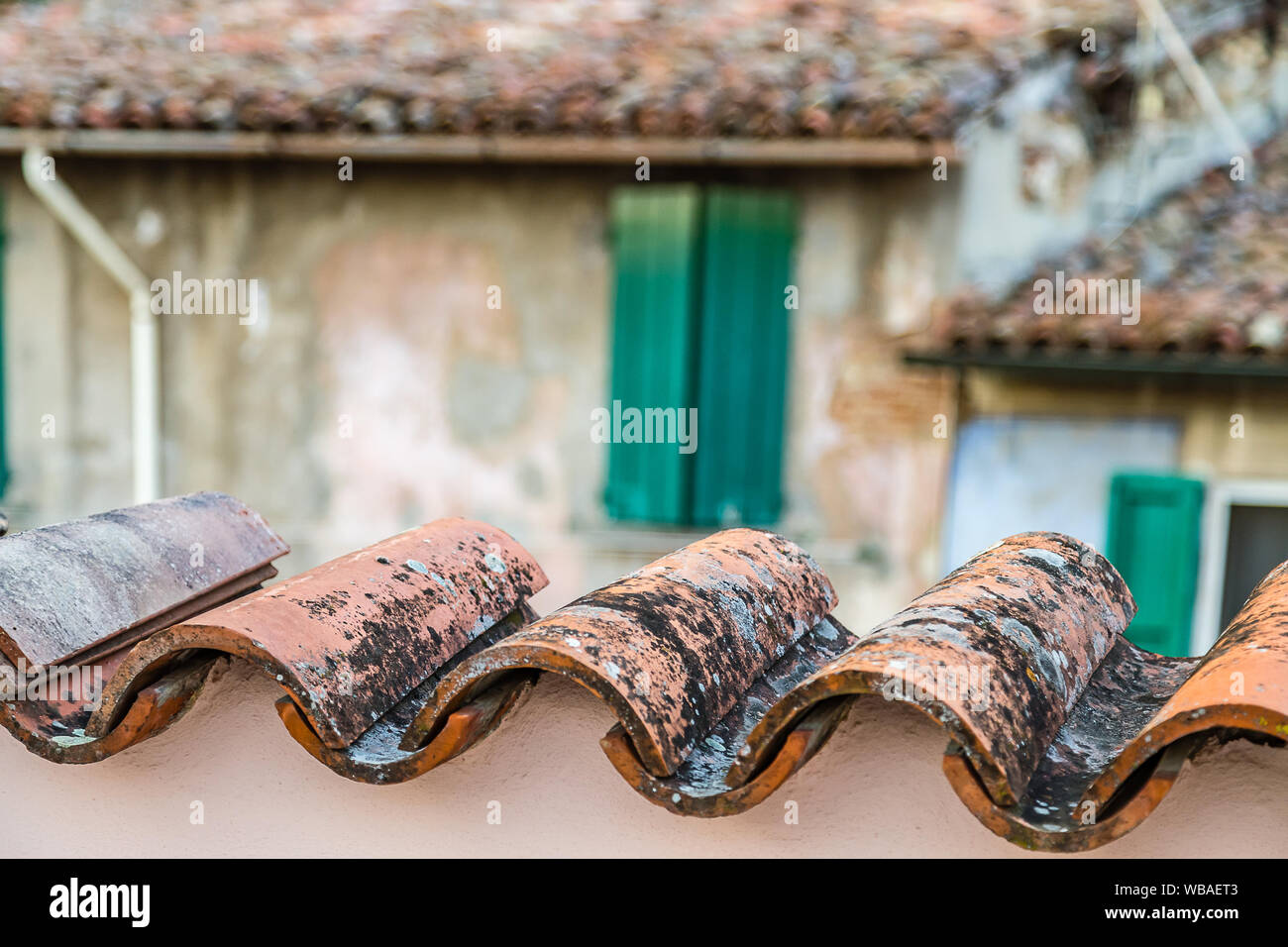 tile roofs of medieval village in Italy Stock Photo - Alamy