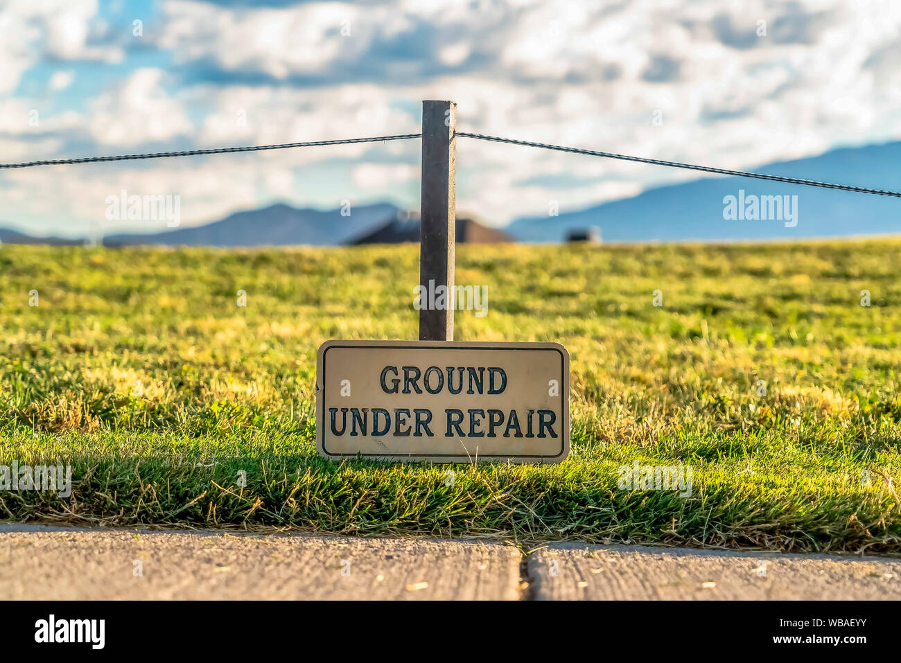 Ground under repair sign hi-res stock photography and images - Alamy
