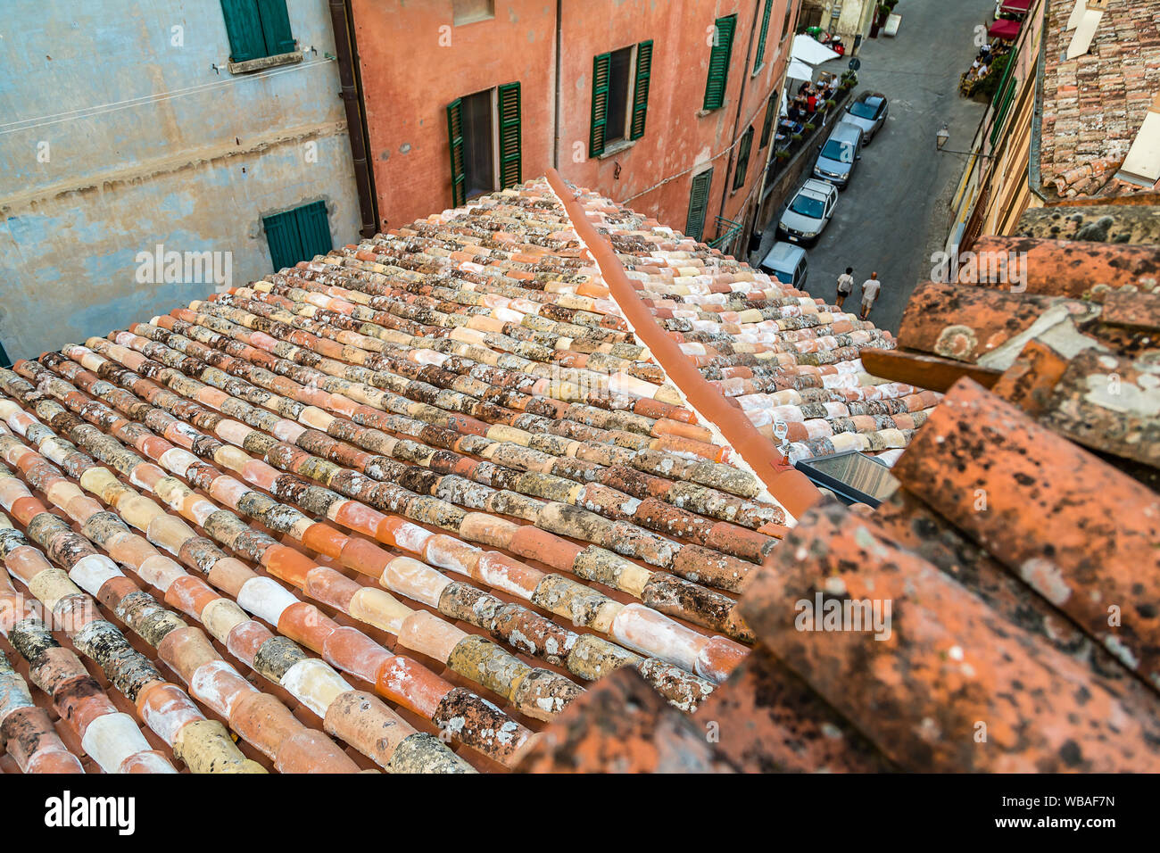 tile roofs of medieval village in Italy Stock Photo - Alamy