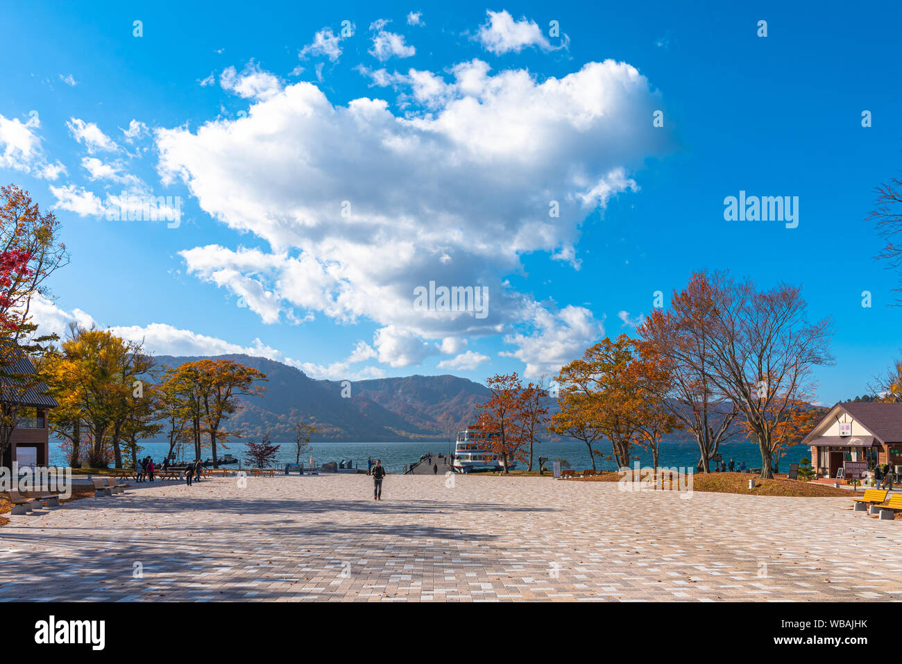 Beautiful view from Lake Towada lakeside pier, clear sky with blue ...