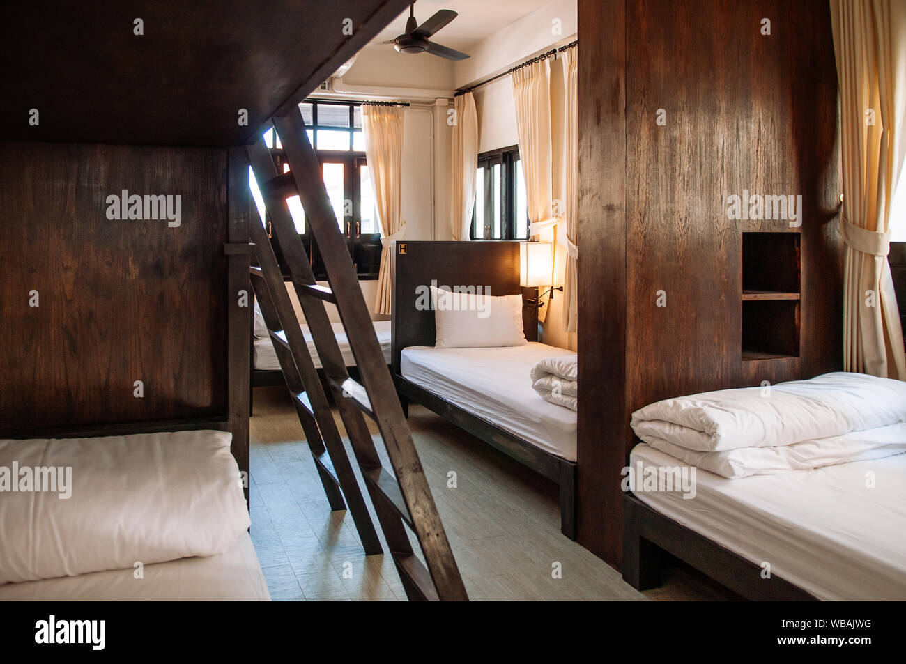 FEB 12, Chiang Mai, THAILAND - Hostel dormitory bunk beds arranged in ...
