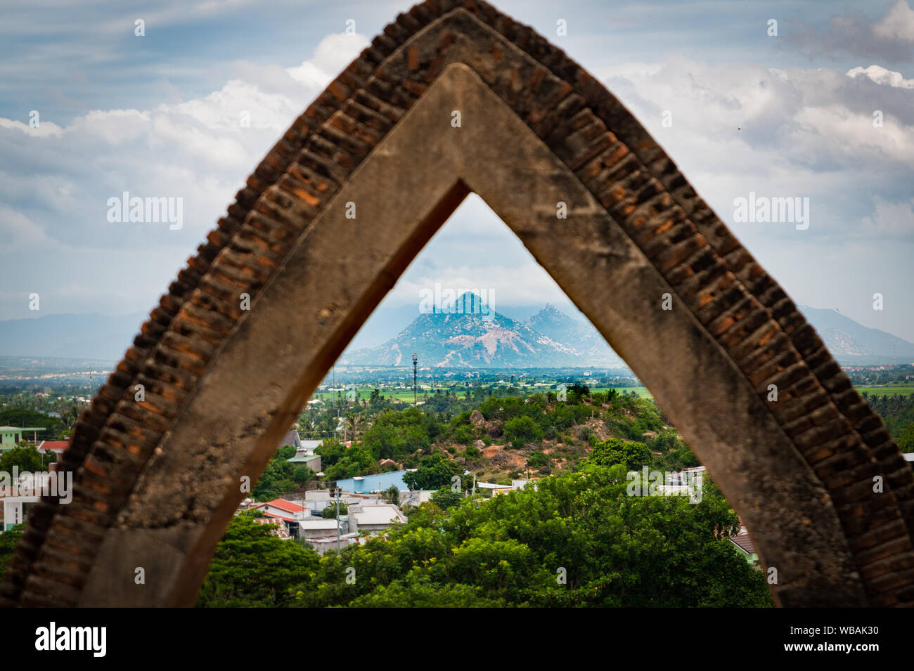 mountain view through gate of Poklongarai champa tower. Located in Phan ...