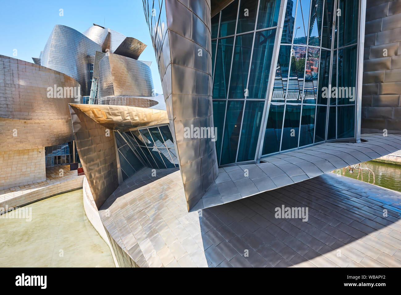 Bilbao downtown Guggenheim museum titanium metallic facade. Cultural ...