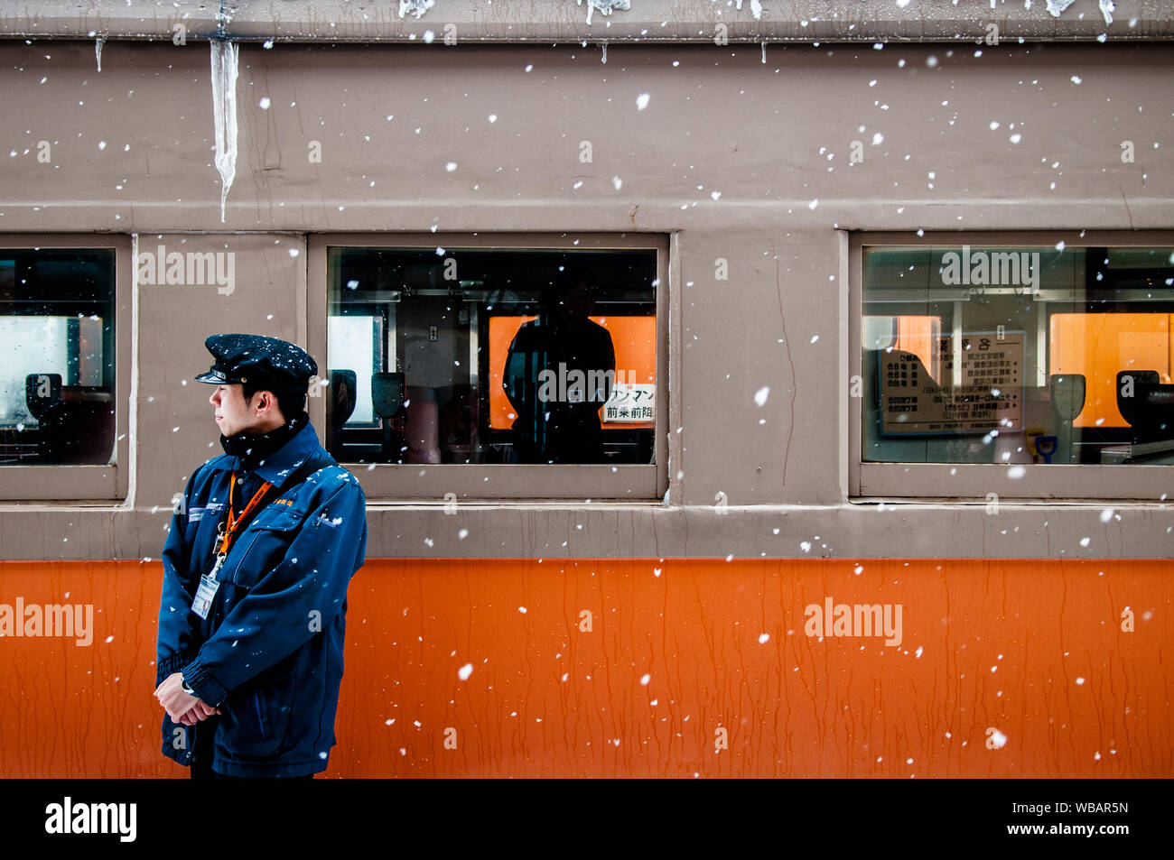 JAN 21, 2014 Aomori, Japan : Train conductor officer waiting passenger ...