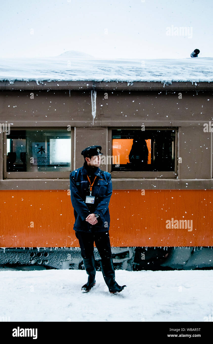 JAN 21, 2014 Aomori, Japan : Train conductor officer waiting passenger ...