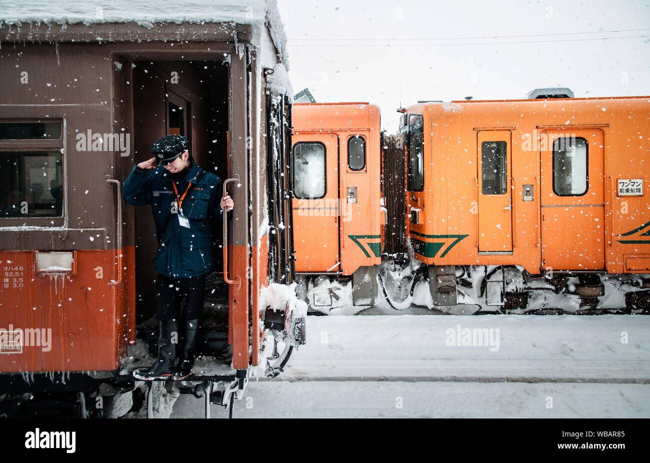 JAN 21, 2014 Aomori, Japan : Train conductor officer riding on vintage ...
