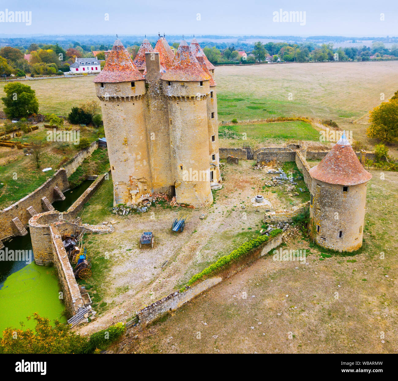 View of gorgeous medieval castle Chateau Sarzay in village of Sarzay ...