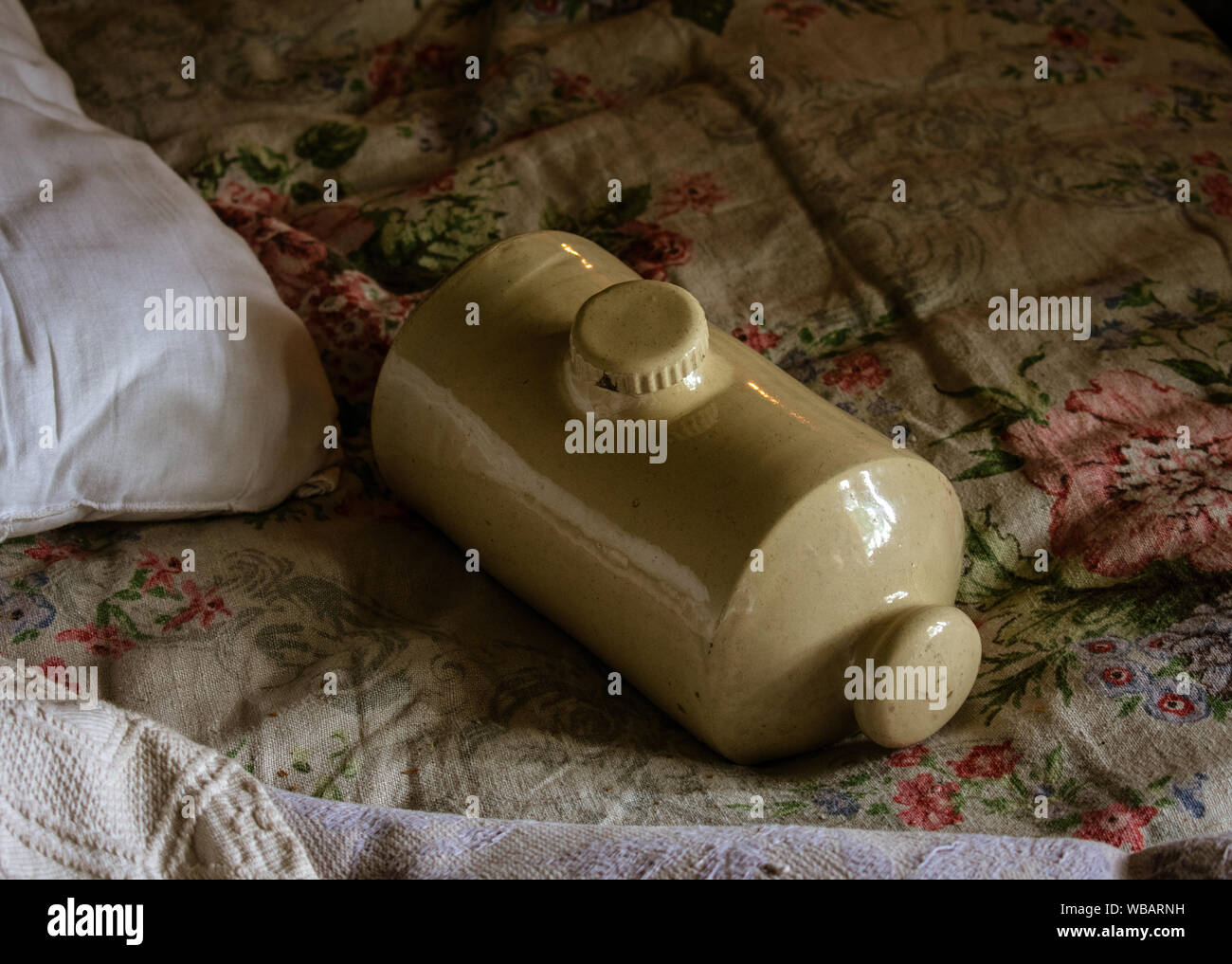 Vintage stoneware hot water bottle, also known as a pig Stock Photo - Alamy