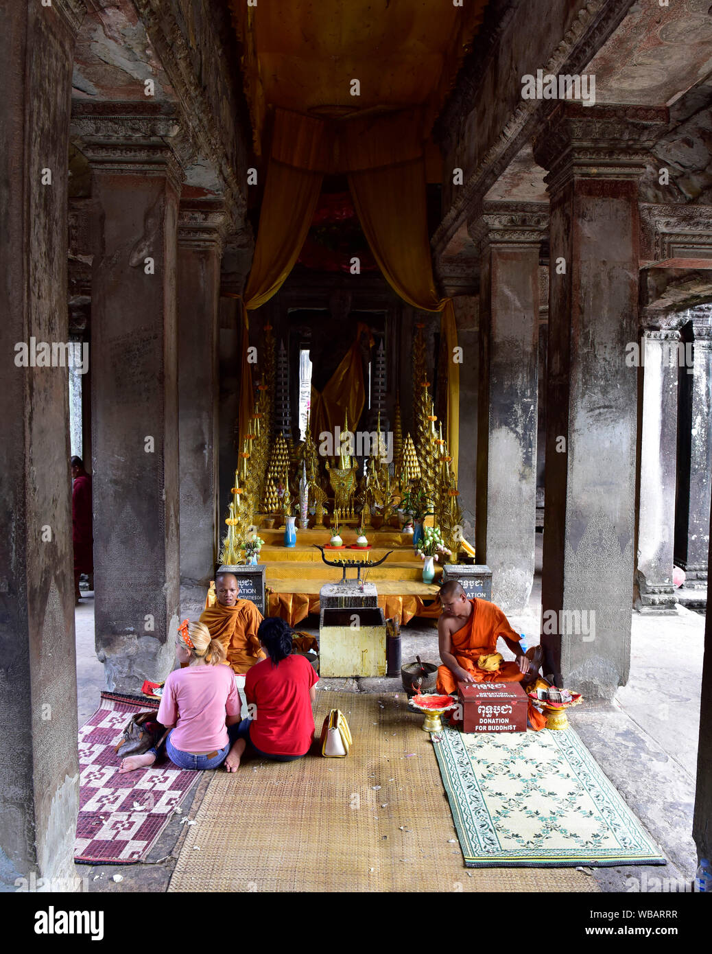 Monks giving blessings at Angkor Wat, Siem Reap, Cambodia Stock Photo ...