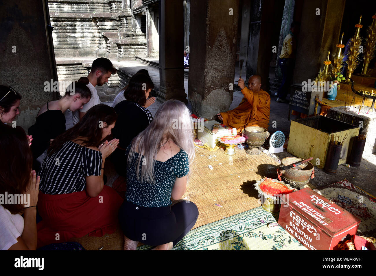 Monks giving blessings at Angkor Wat, Siem Reap, Cambodia Stock Photo ...