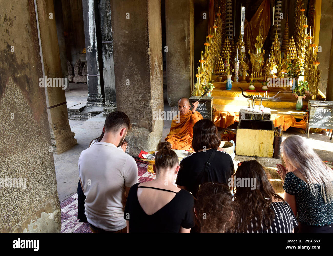 Monks giving blessings at Angkor Wat, Siem Reap, Cambodia Stock Photo ...