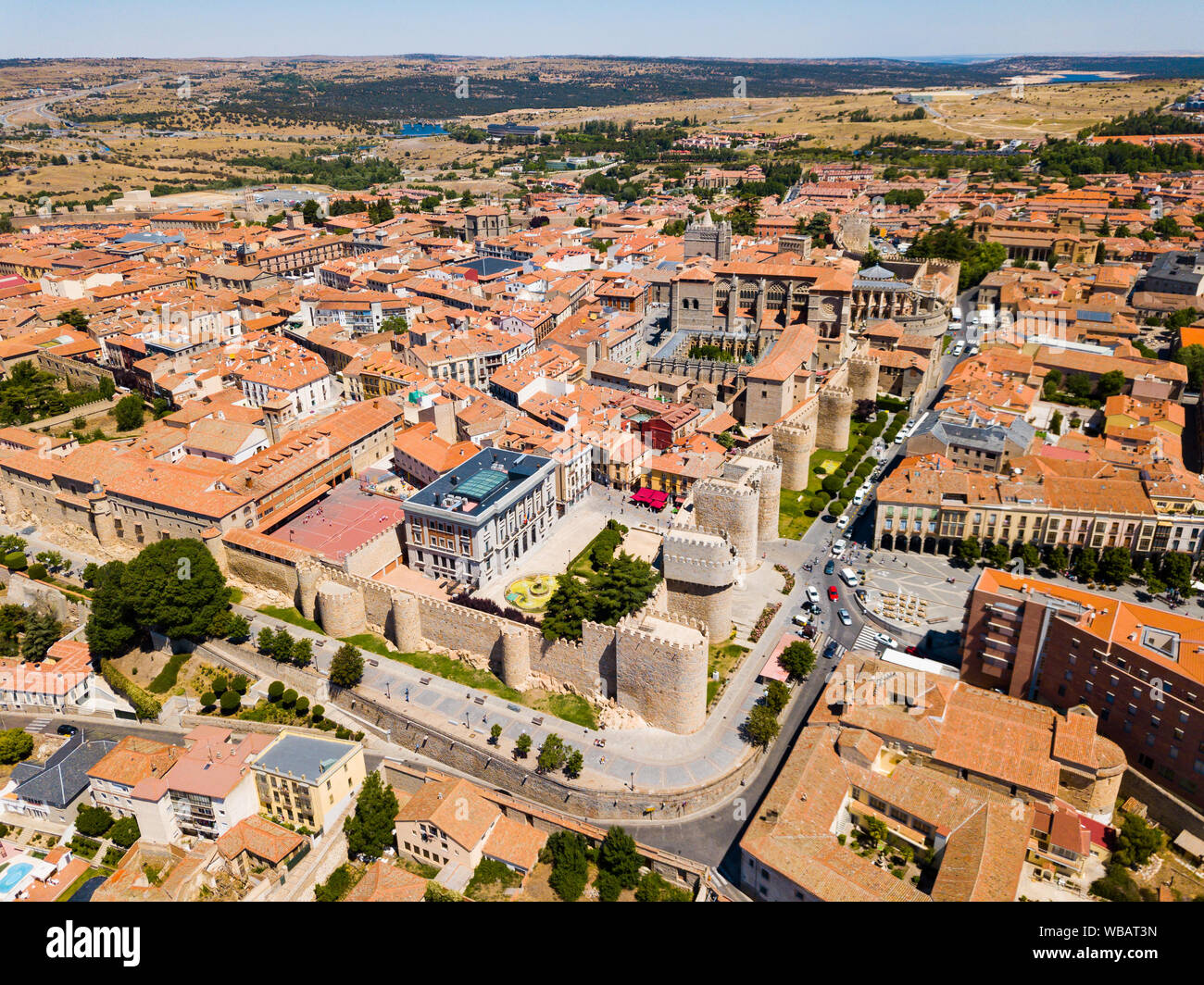 Aerial cityscape of medieval Spanish city Avila with stone defense wall ...