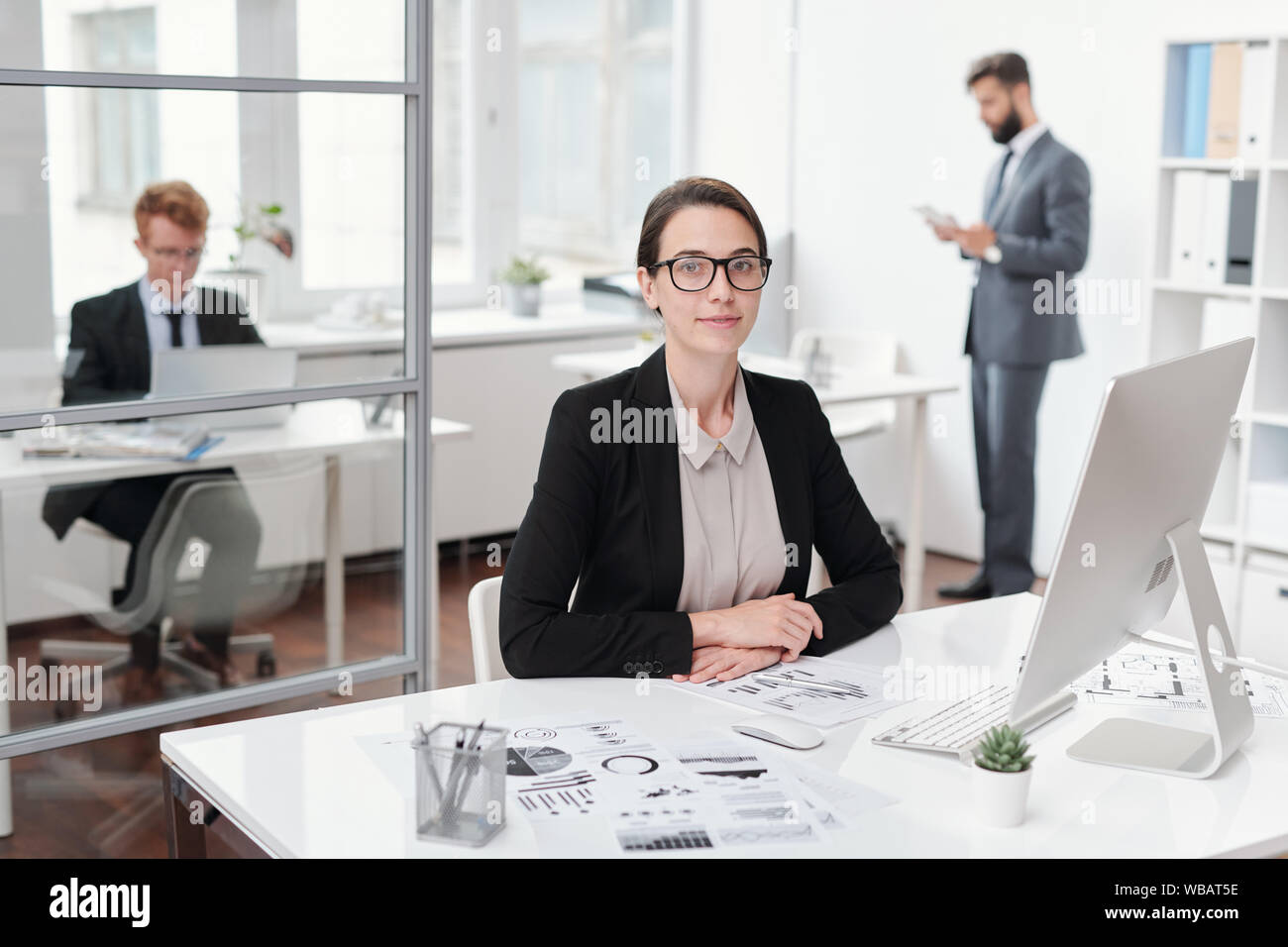 Business Intern Posing at Workplace Stock Photo - Alamy