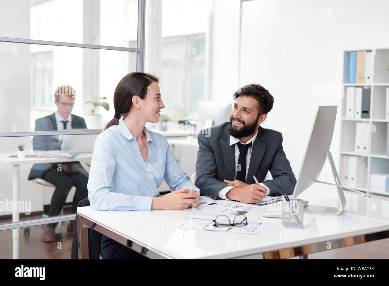 Businessman sitting together colleagues hi-res stock photography and ...