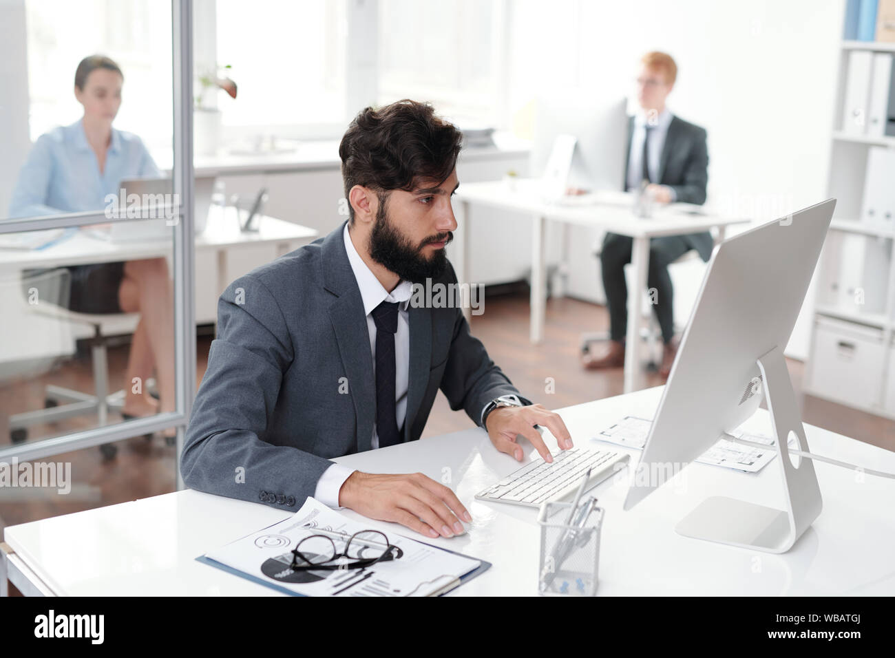 Cheerful businessman working computer hi-res stock photography and ...