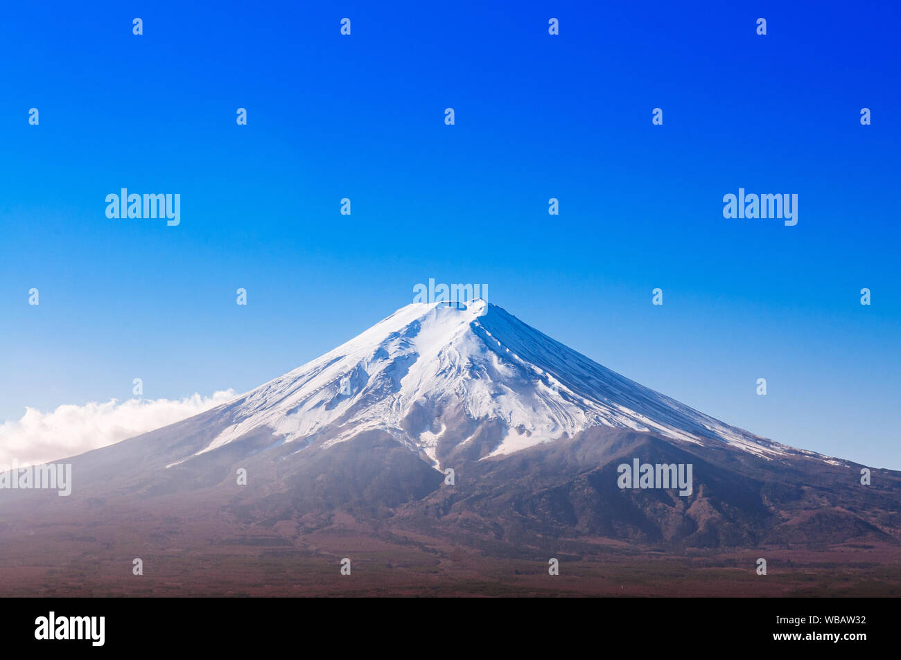 Mount Fuji with snow covered and blue sky in autumn season, clearly ...