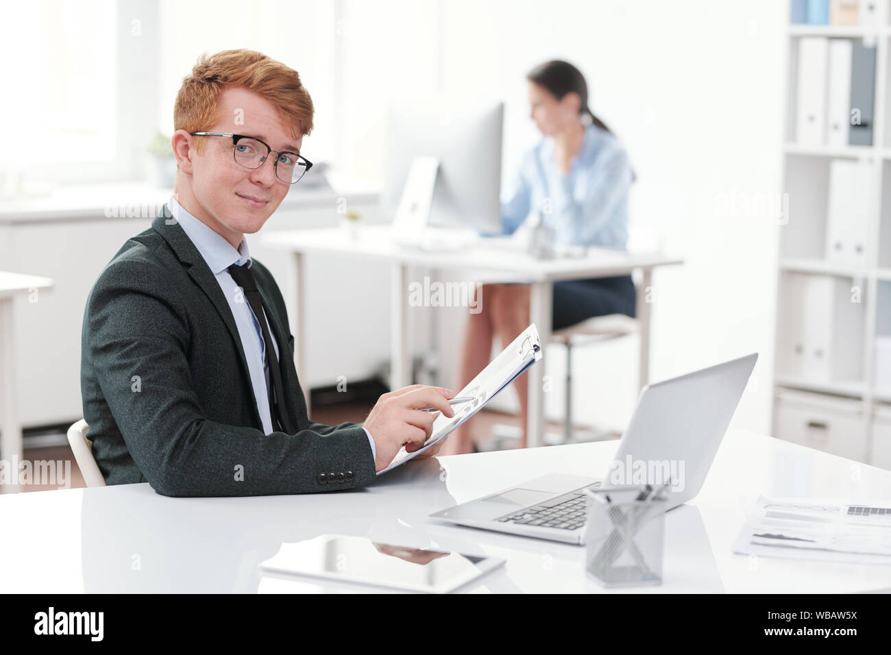 Young Business Intern Stock Photo - Alamy