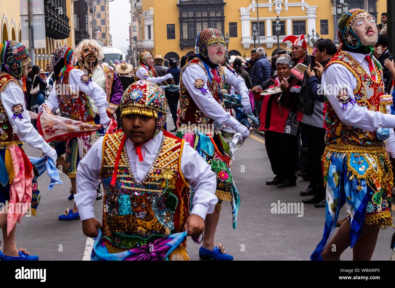 Girl with colorful peruvian colors hi-res stock photography and images ...