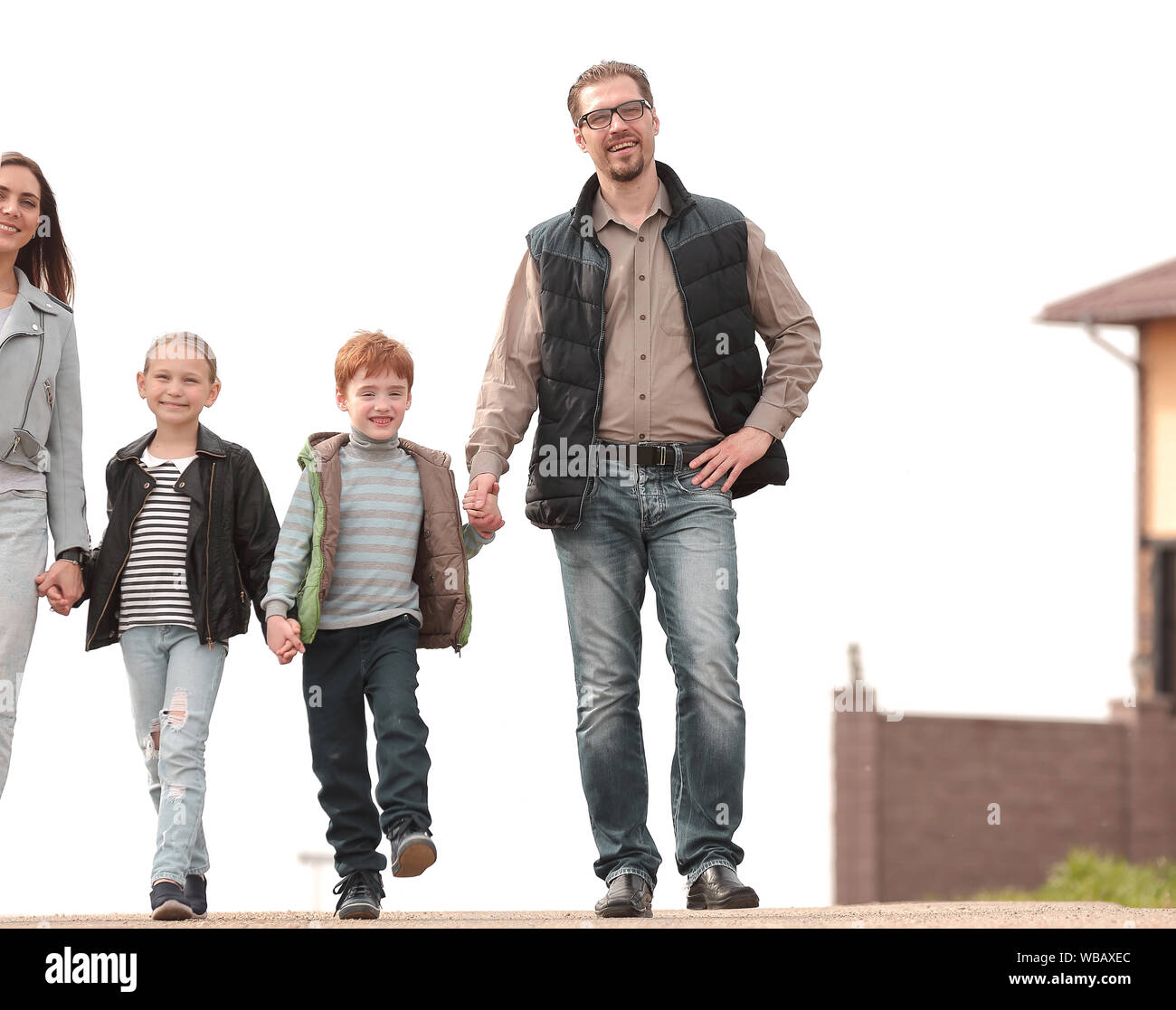 Children running towards parents hi-res stock photography and images ...