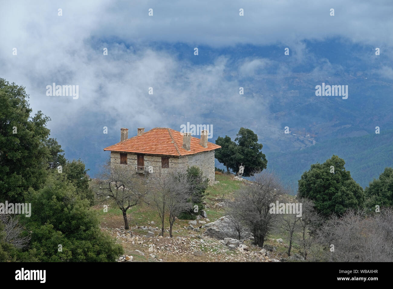 Stone house mountains trees hi-res stock photography and images - Alamy