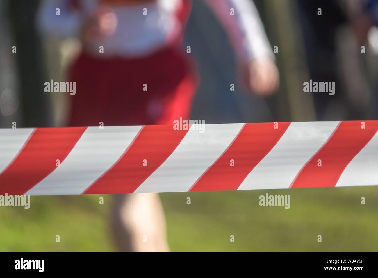Long distance runner finish line hi-res stock photography and images ...