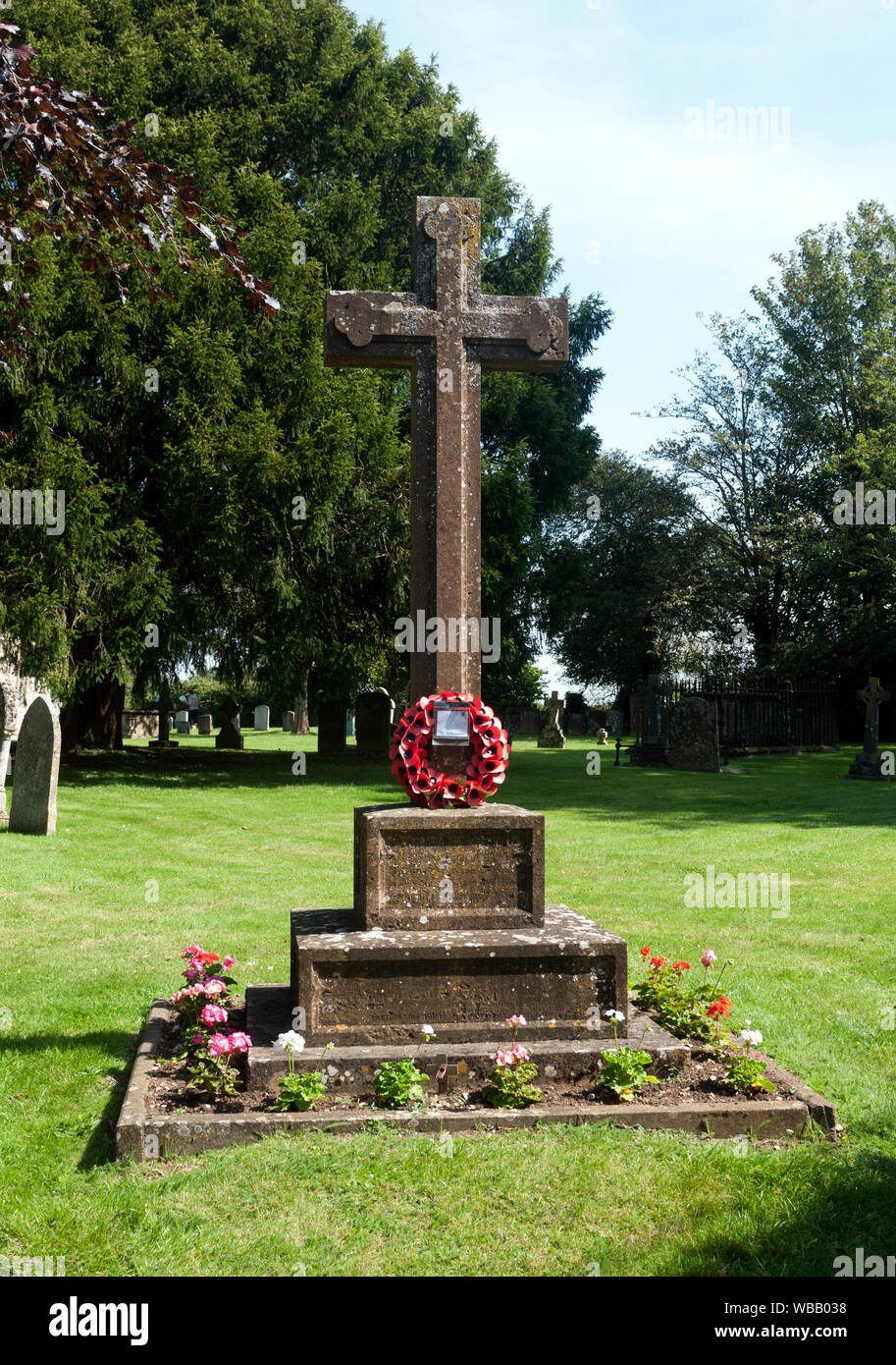The war memorial in St Michael and All Angels churchyard, Finmere ...