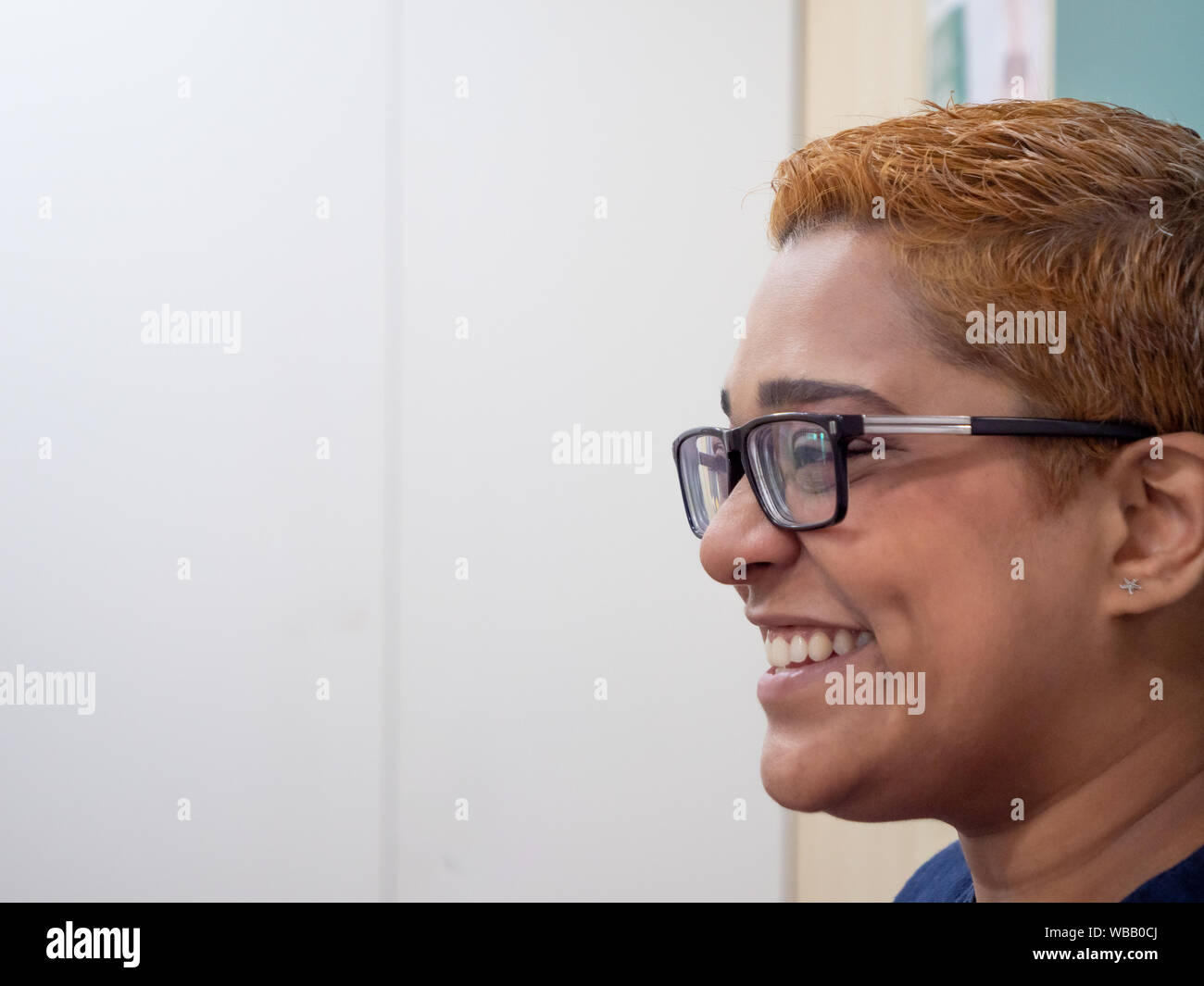 Lady cheeky smile hi-res stock photography and images - Alamy