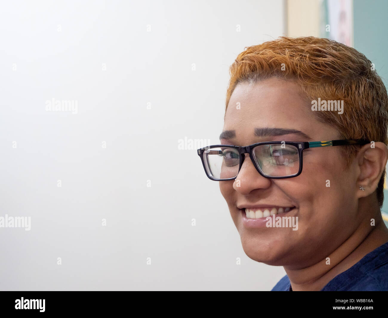 Lady cheeky smile hi-res stock photography and images - Alamy