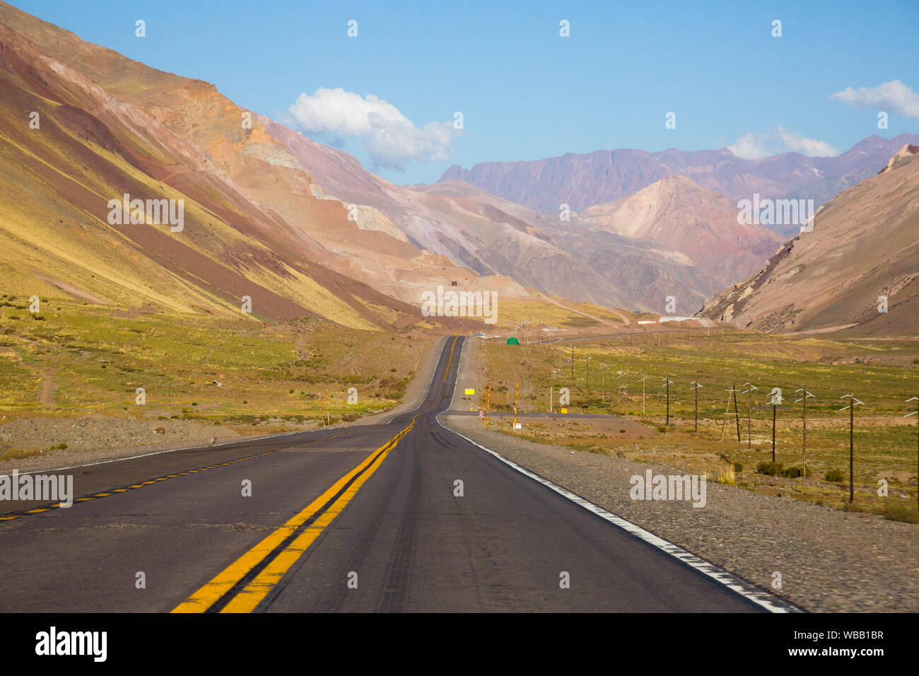 View of road through mountain pass (Paso Los Libertadores) on border of ...