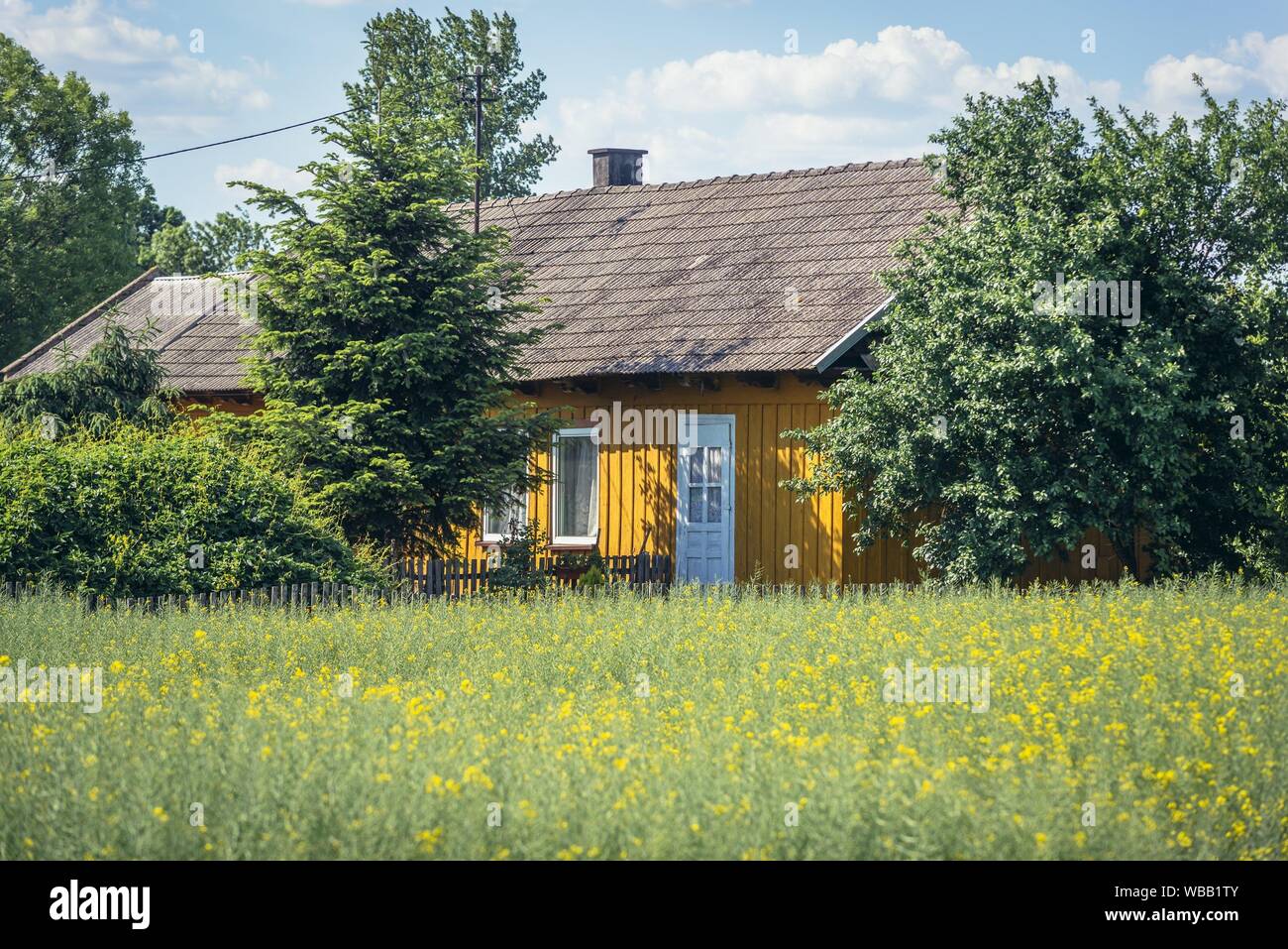 Wooden cottage, characteristic for Polish villages Stock Photo - Alamy