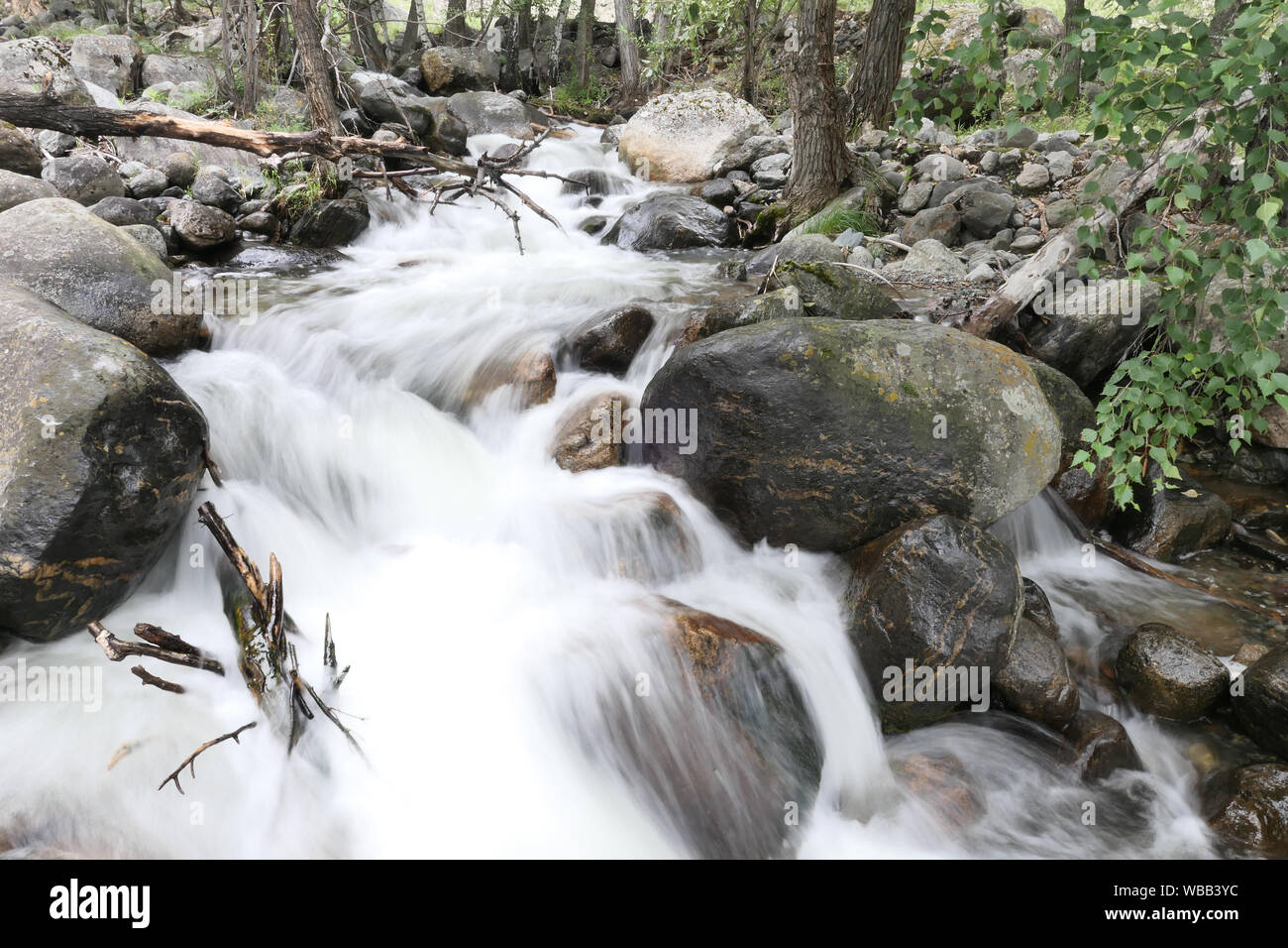 Beautiful mountain river with slow shutter Stock Photo - Alamy