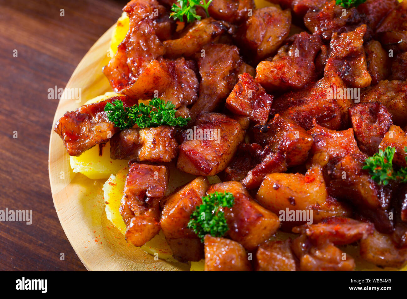 Morro de cerdo a la gallega - spanish dish. Roast nose and cheek pigs ...