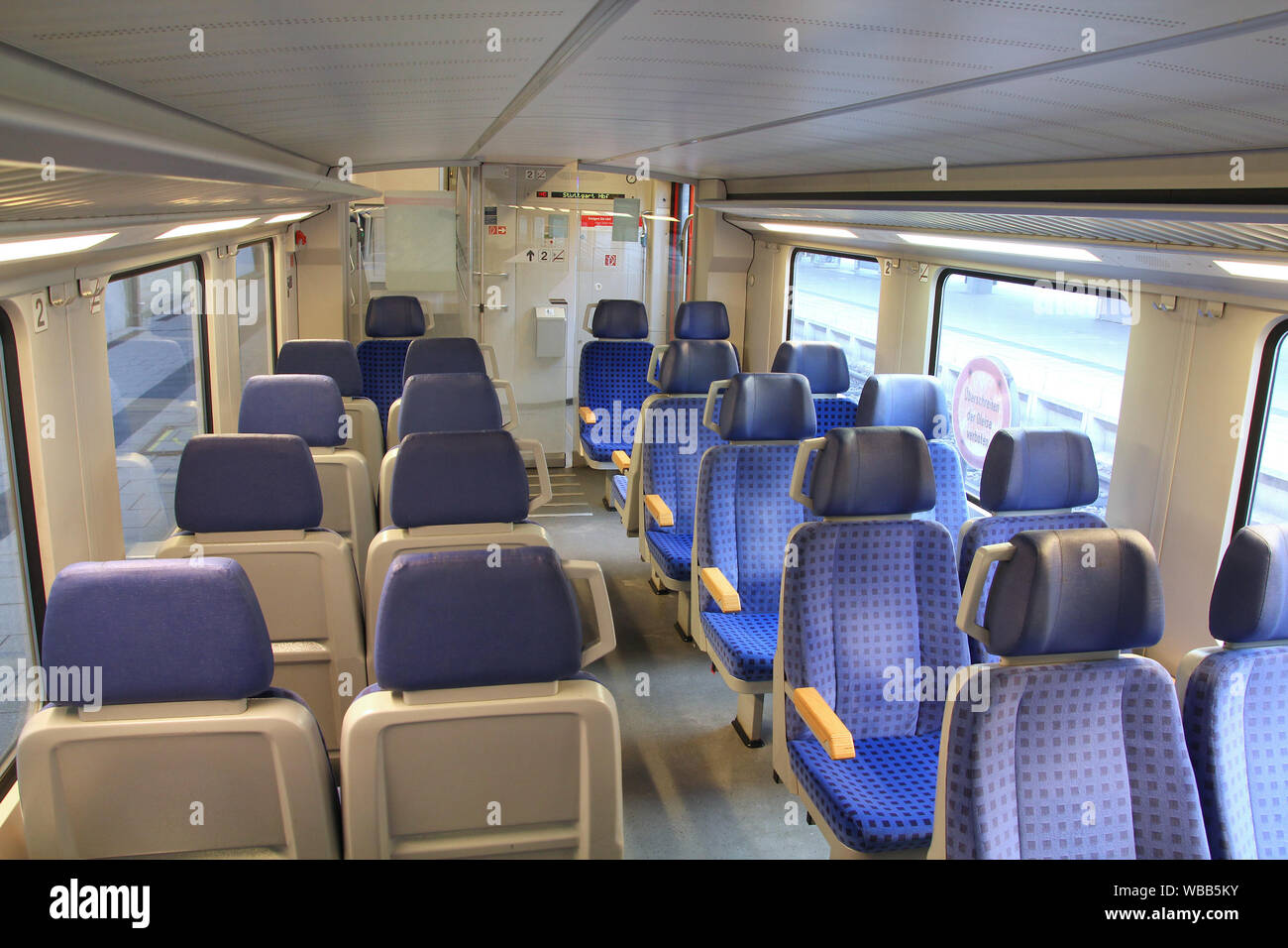 Blue seats train carriage hi-res stock photography and images - Alamy