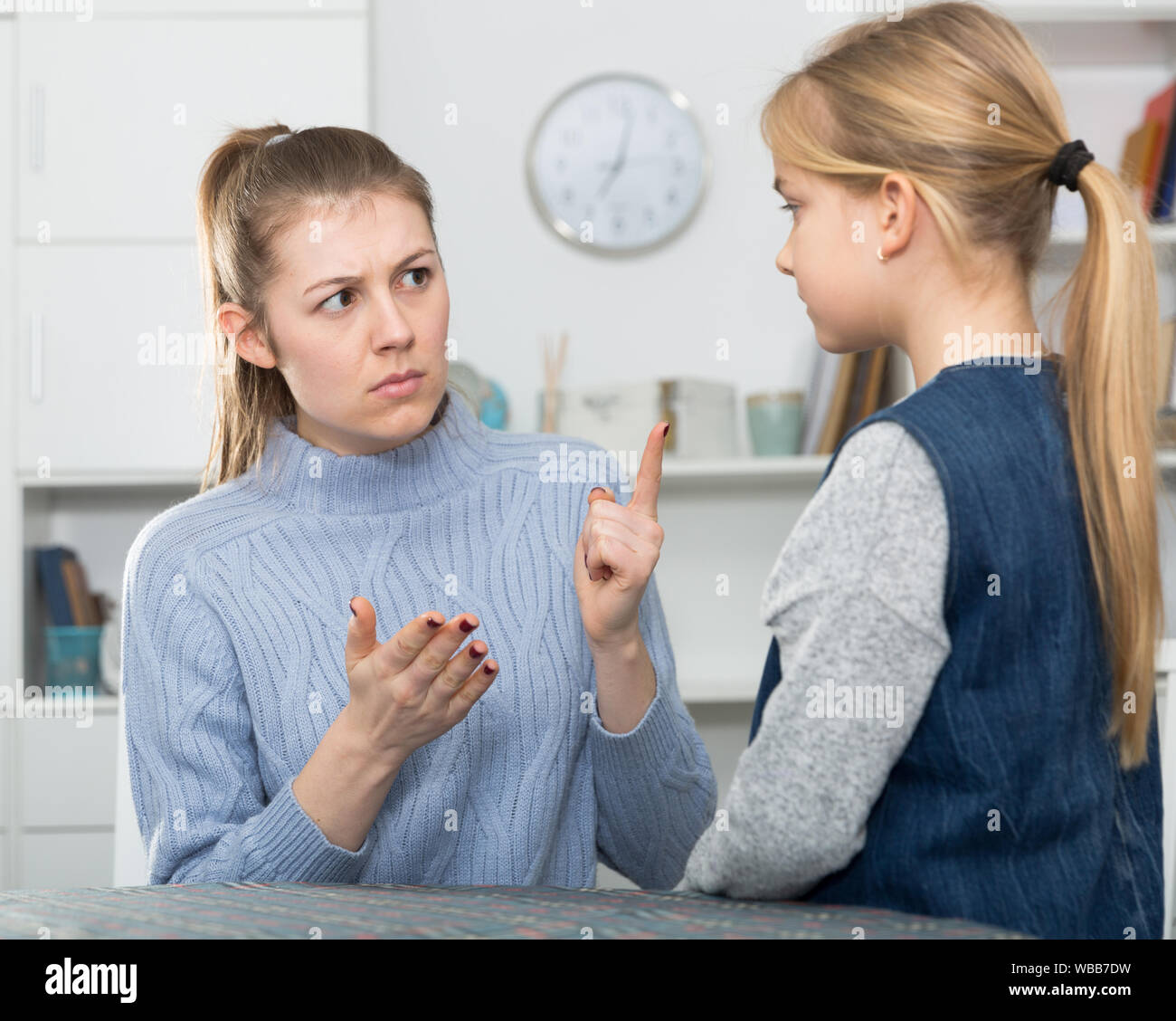 Serious adult mother scolding her teenage daughter at home Stock Photo - Alamy