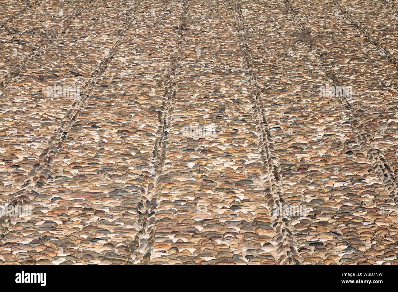 Cobblestone background texture. Cobbled square in Cordoba, Spain Stock ...