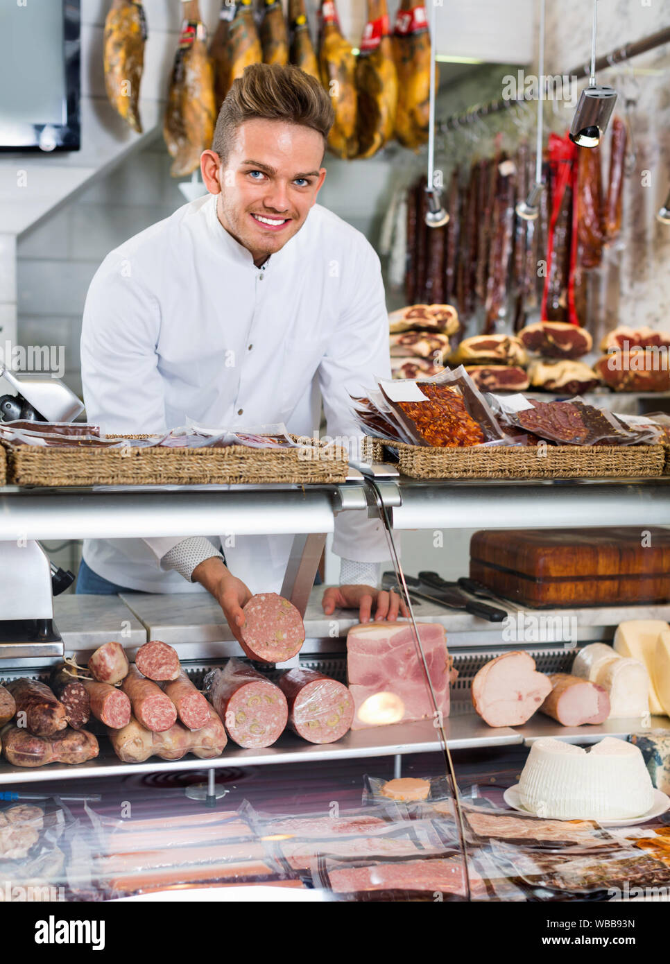 Male shop assistant welcoming hi-res stock photography and images - Alamy