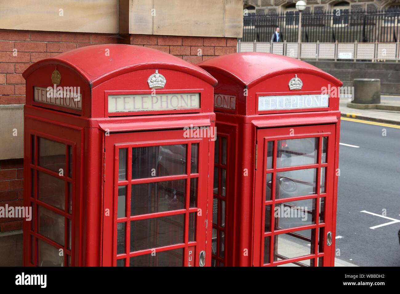 Leeds - city in West Yorkshire, UK. Red telephone booths Stock Photo ...
