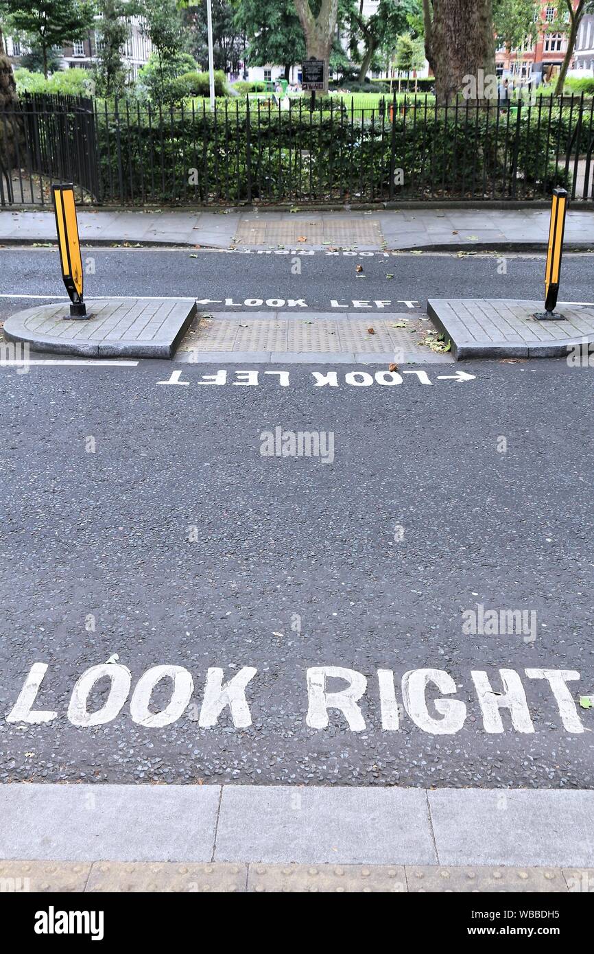 London pedestrian signs - look right and look left. Traffic warning ...