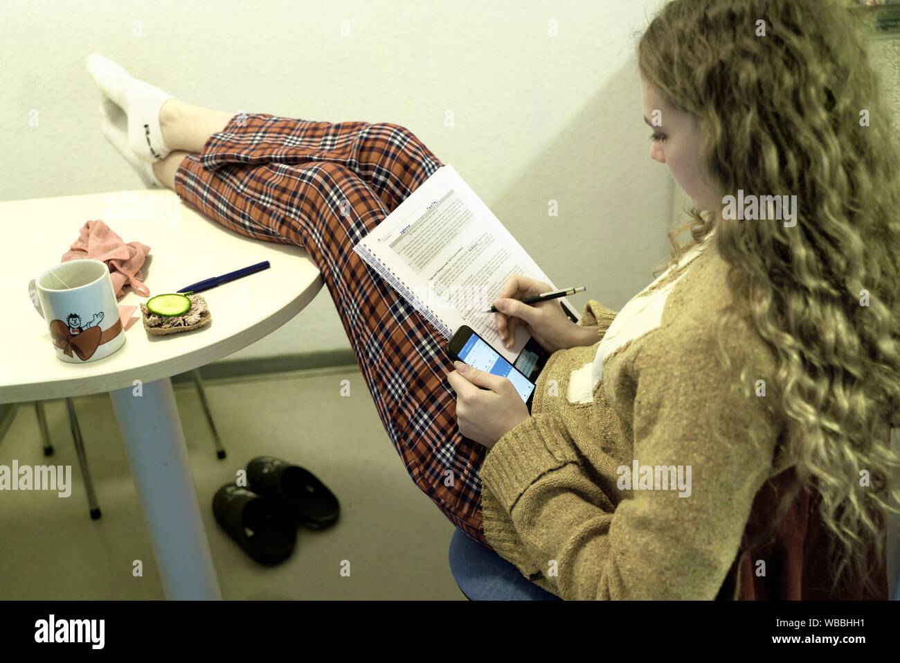 Propped up legs hi-res stock photography and images - Alamy