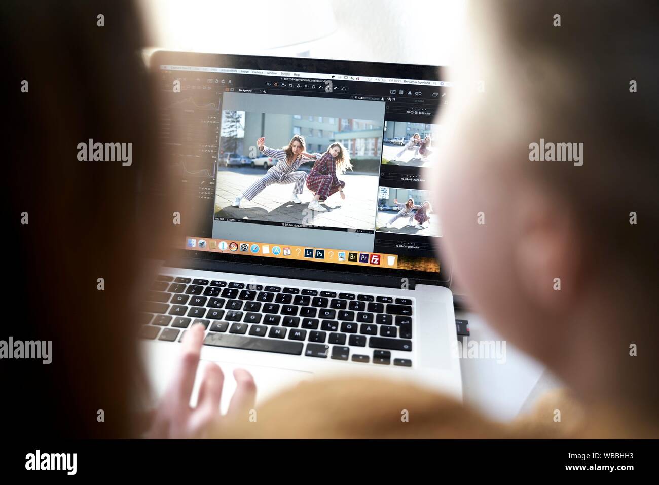 Choosing photos laptop hi-res stock photography and images - Alamy