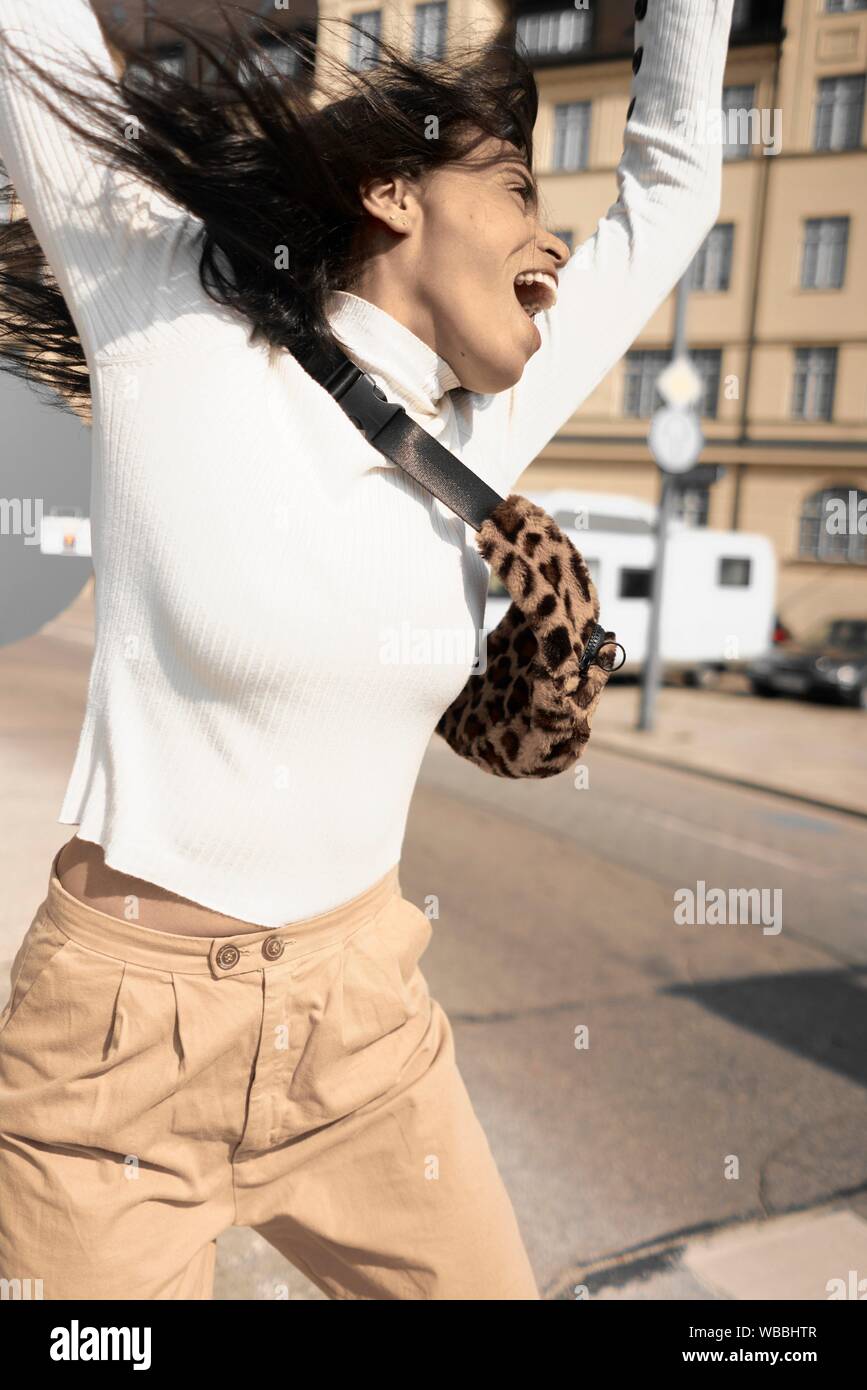 Exuberant african woman hi-res stock photography and images - Alamy