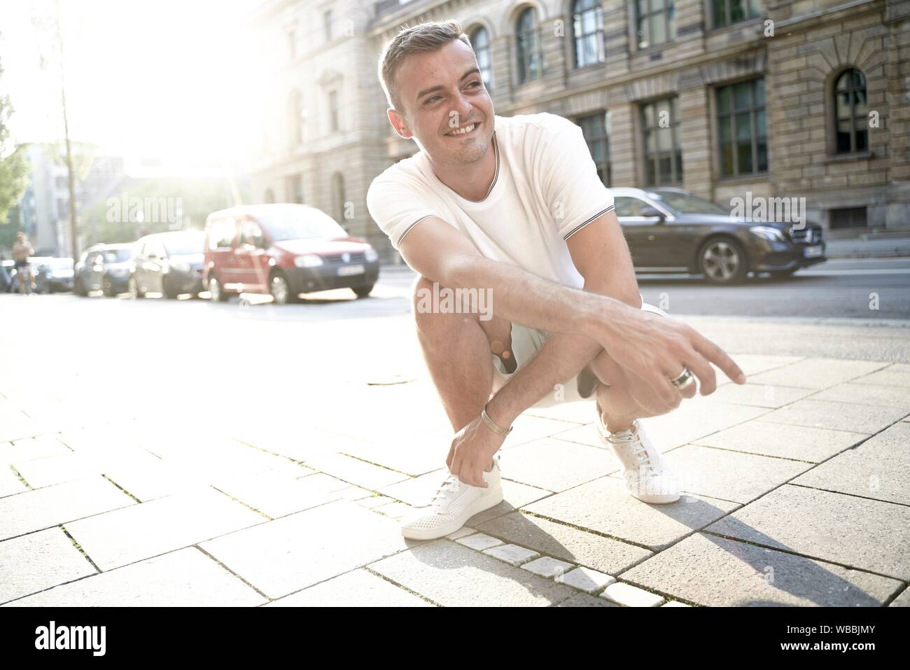 Crouching Male Figure High Resolution Stock Photography and Images - Alamy
