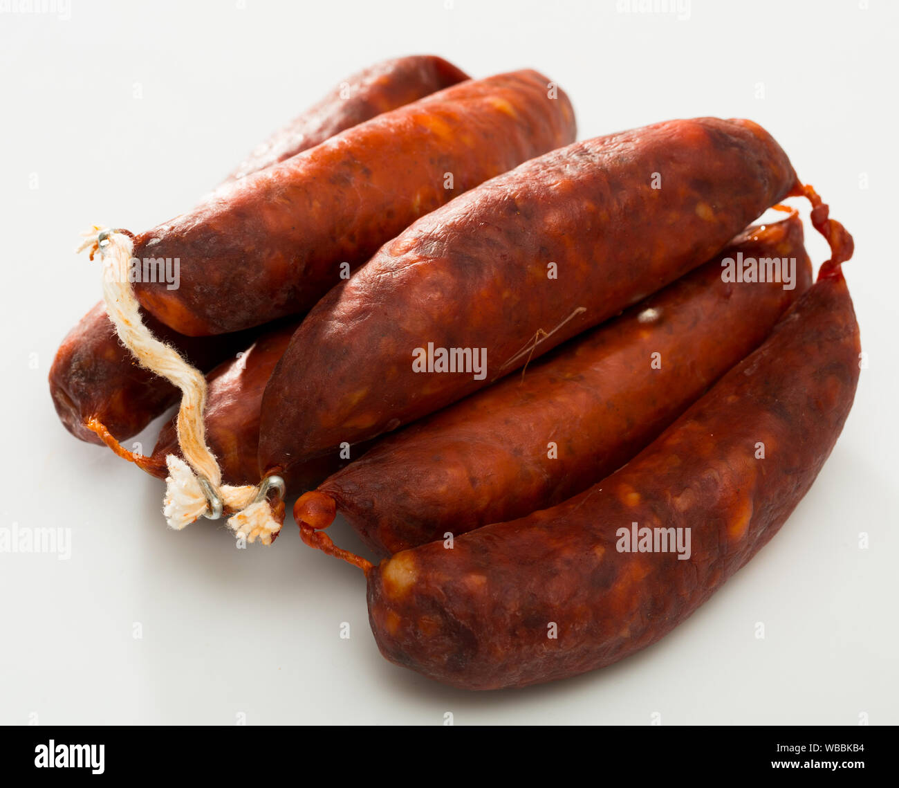 Traditional Spanish chorizo sausages on white background Stock Photo ...