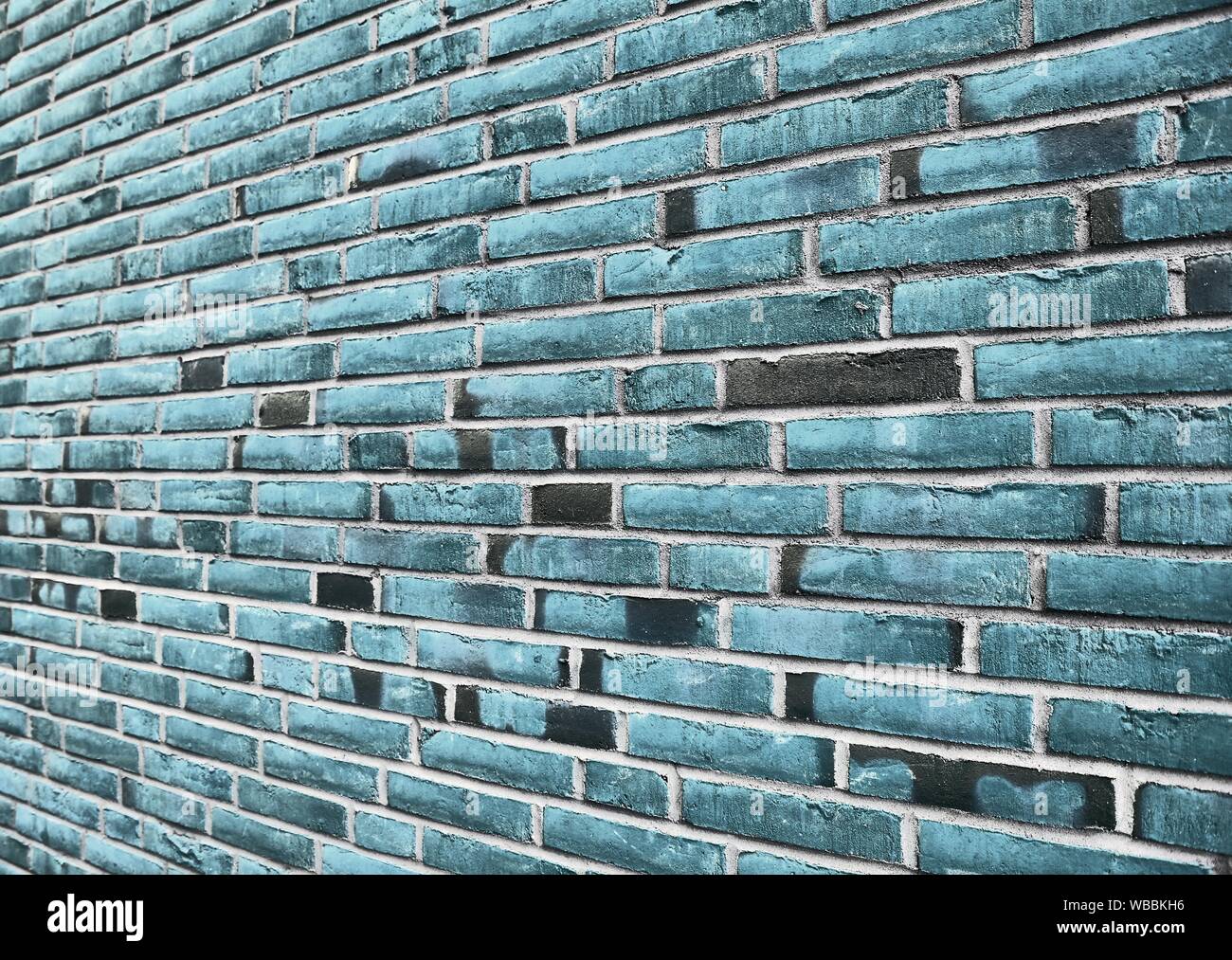 Detailed close up view on old aged blue brick walls in high resolution ...