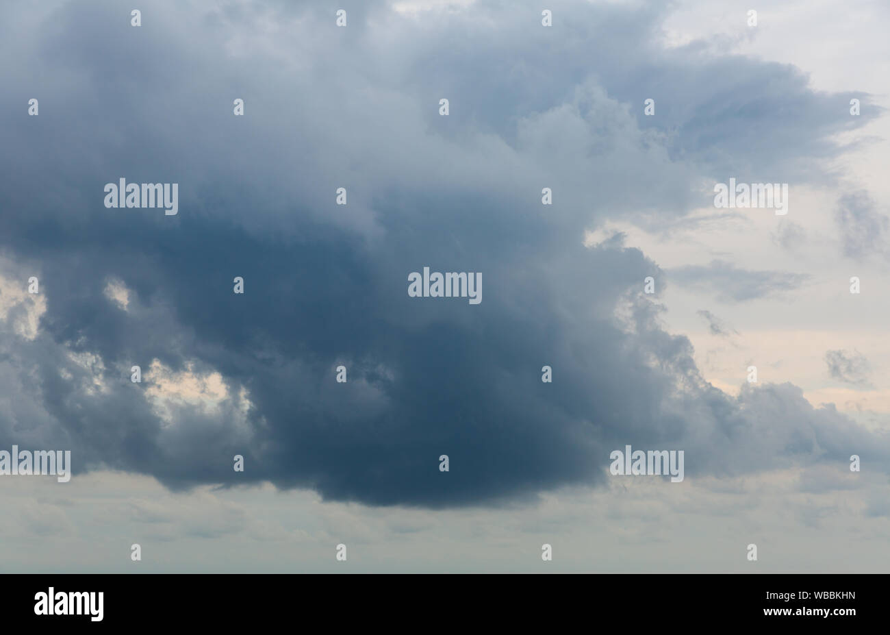Murky summer sky covered with grey clouds. Nature in waiting for rain ...