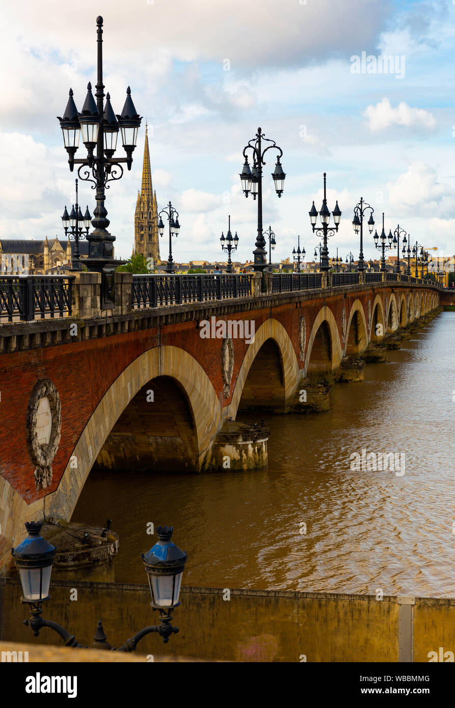 Bordeaux river bridge with St Michel cathedral. France Stock Photo - Alamy