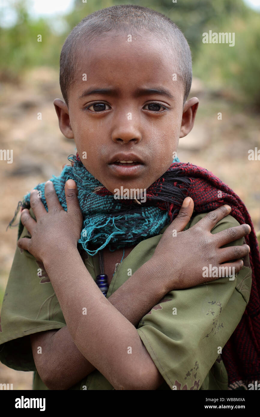 Poor boy in a rural village in the Simien Mountains, Ethiopia Stock ...