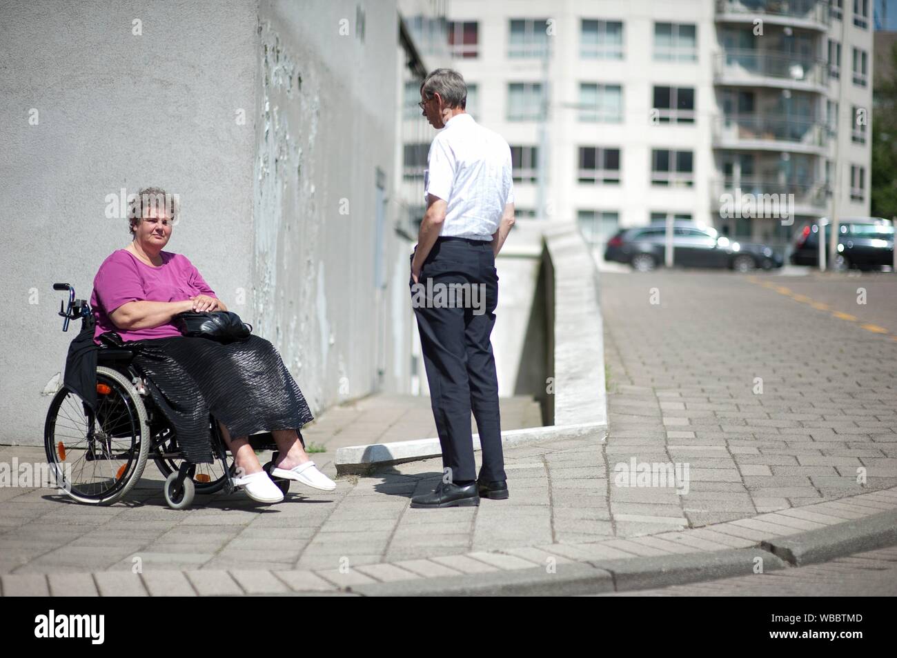 Mature adult walking neighborhood hi-res stock photography and images ...