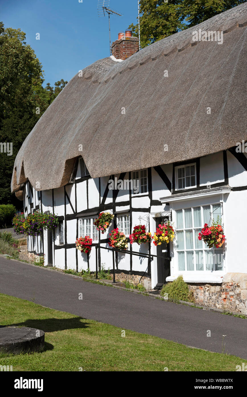 Wherwell, Hampshire, England, UK. Old thatched houses in Wherwell a ...